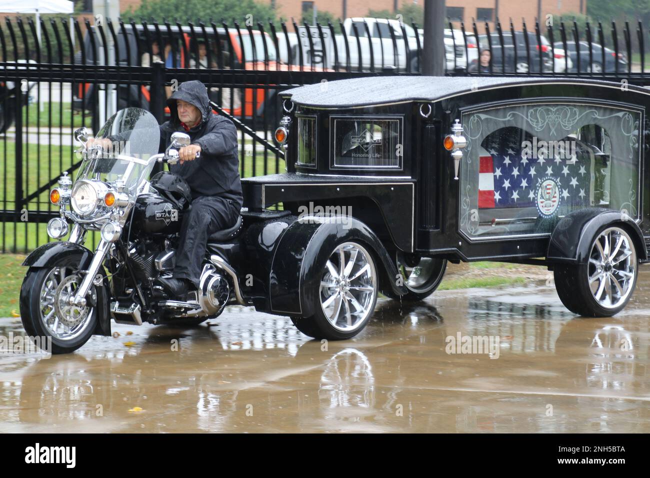 Roger Stewart, an employee of Staab Funeral Homes, drives the Staab ...