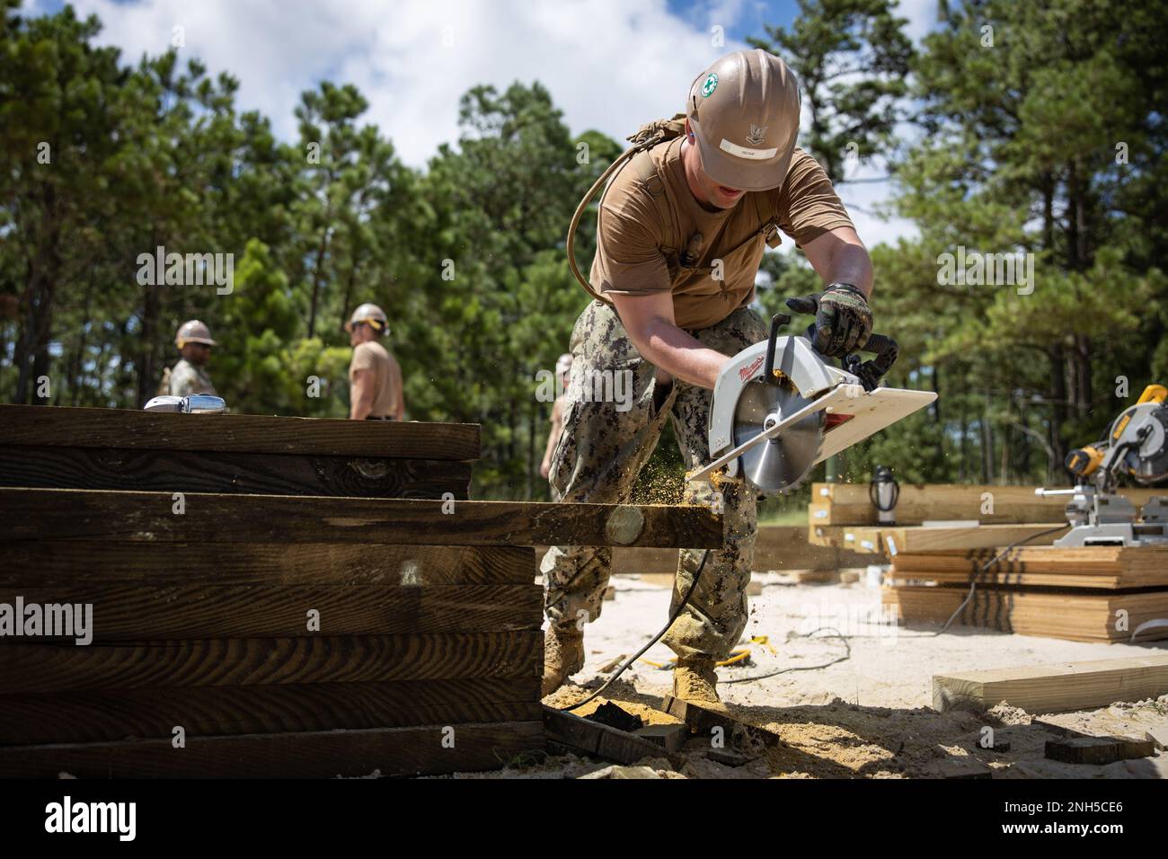 U.S. Navy Engineer Aide 2nd Class Greg Ische with Naval Construction ...