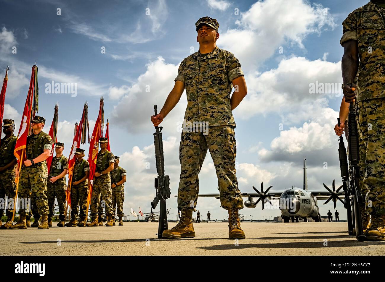 U.S. Marine Corps. marines assigned to Marine Aircraft Group 49 stand ...