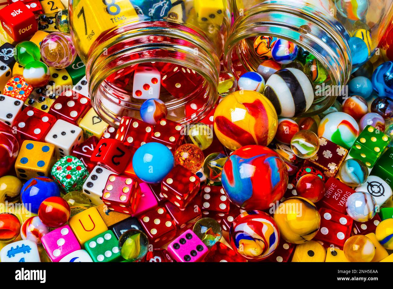 Wonderful Colored Marbles And Dice Stock Photo - Alamy