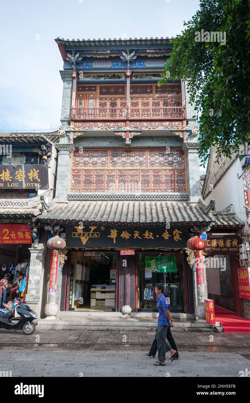 A storefront and building featuring traditional Chinese architecture in ...