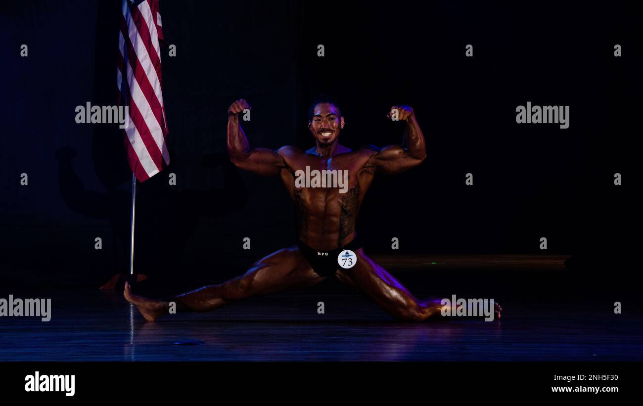 Kazuki Nakasone, Men’s Bodybuilding division competitor, performs a ...