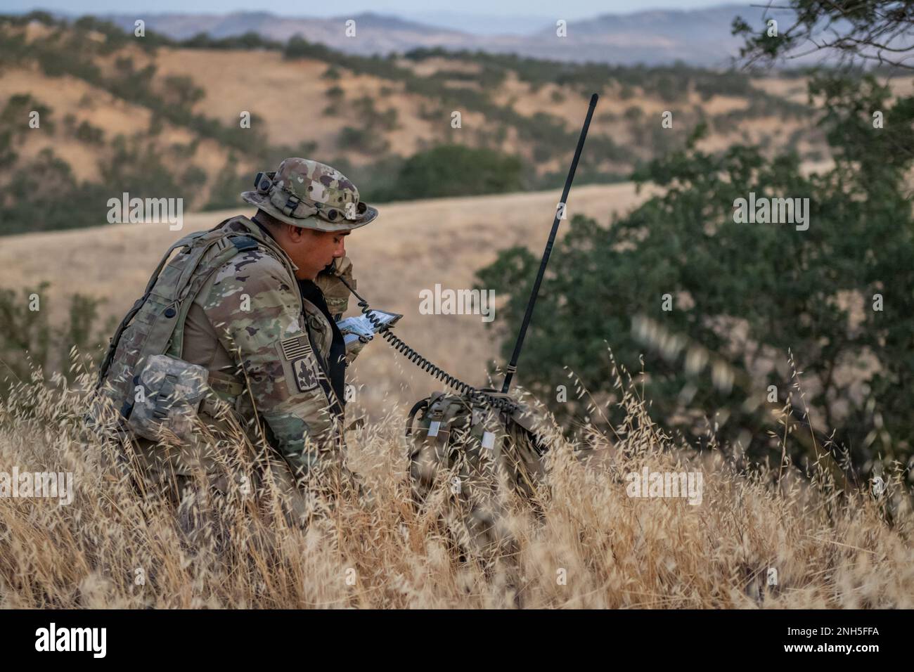 Wyoming Army National Guard Cpl. Taliese Vivao, a radio telephone ...