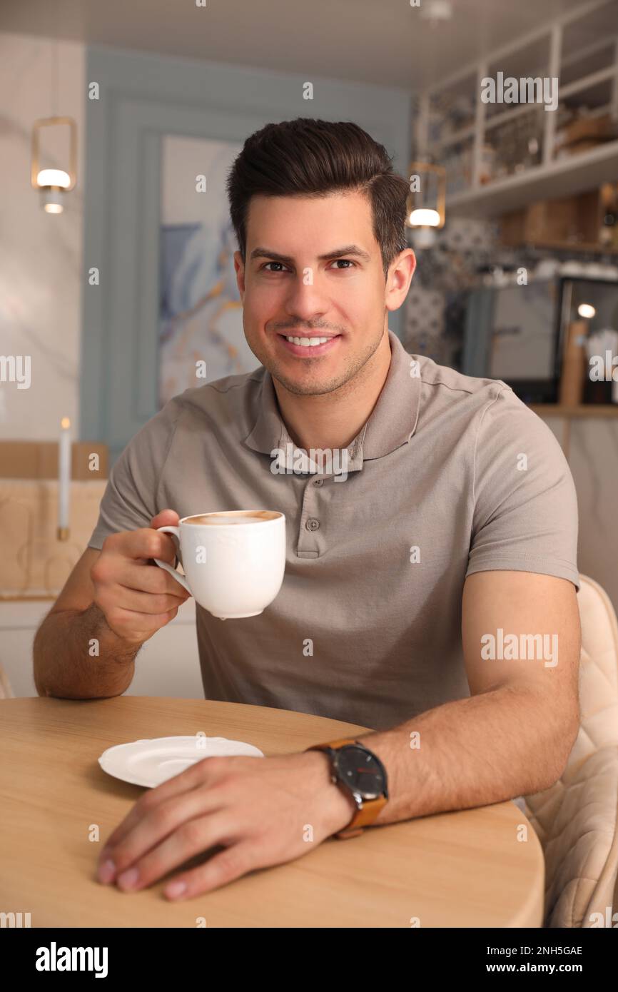 Man with cofee cup hi-res stock photography and images - Alamy
