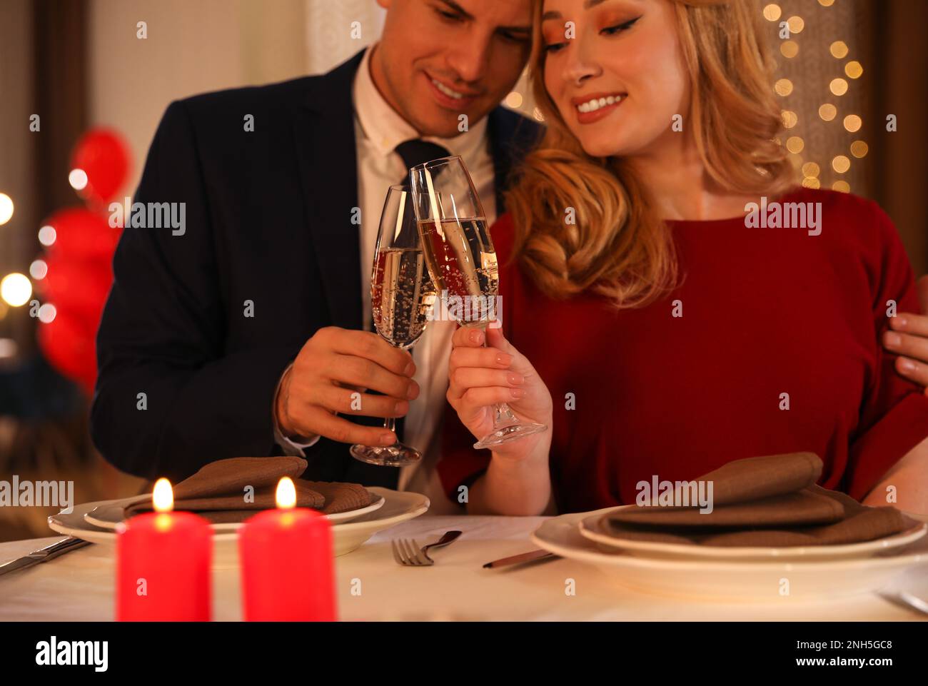 Lovely couple having romantic dinner in restaurant Stock Photo - Alamy
