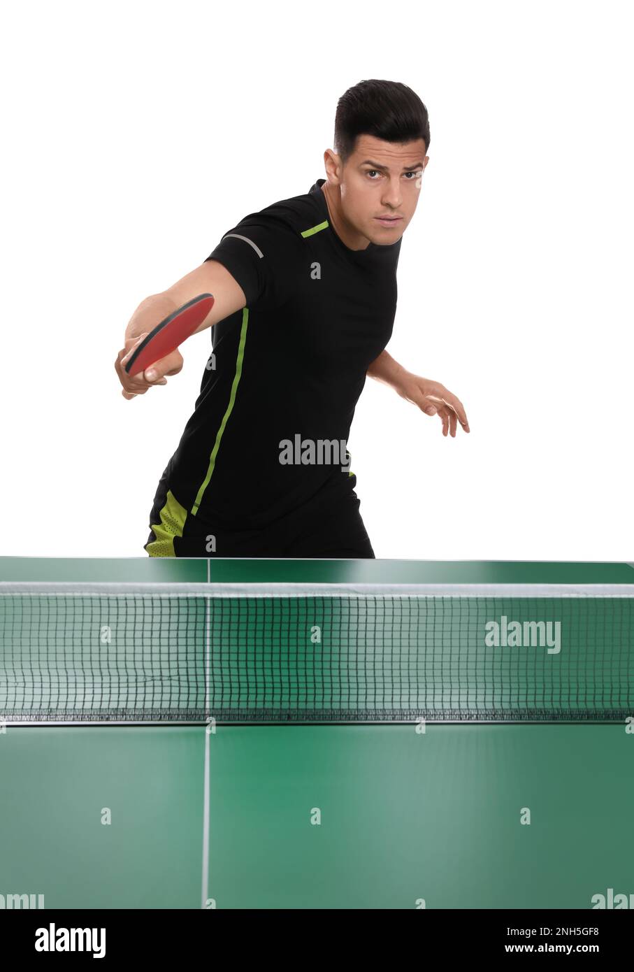 Handsome man playing ping pong on white background Stock Photo - Alamy