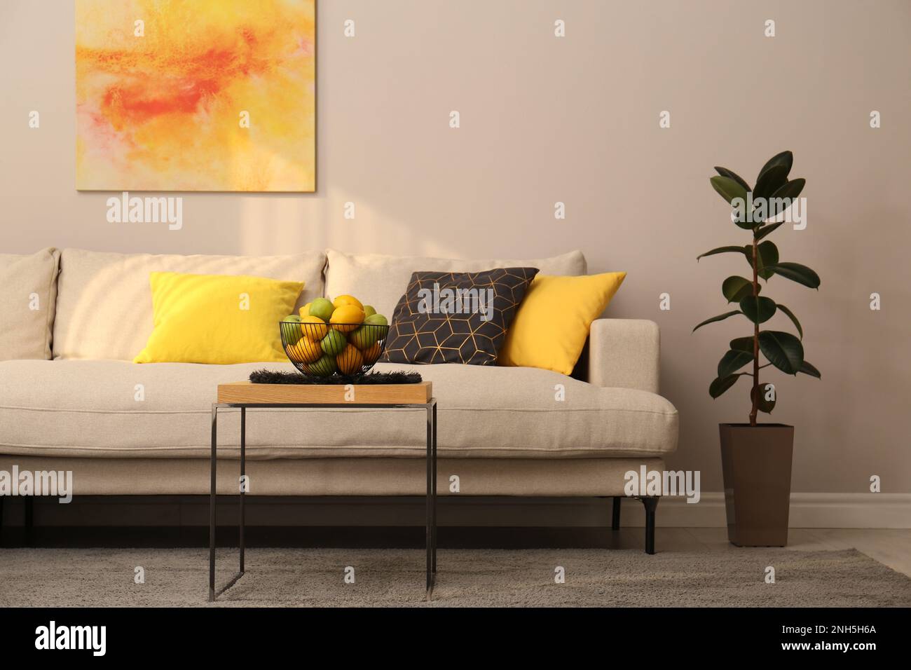 Stylish living room interior with modern comfortable sofa Stock Photo ...