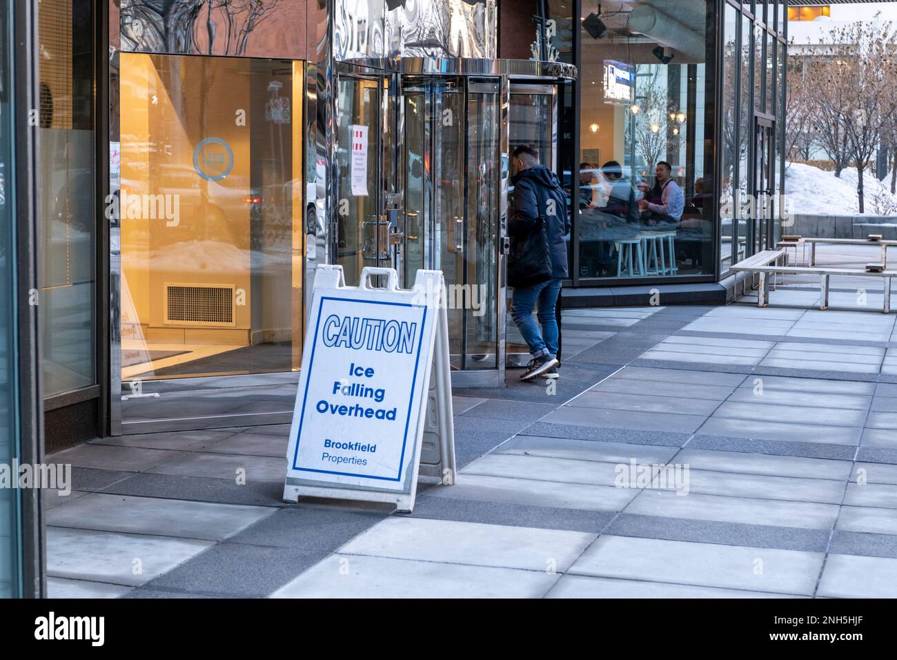 Warning sign of overhead ice falling, Calgary, 2 Street SW, Alberta ...