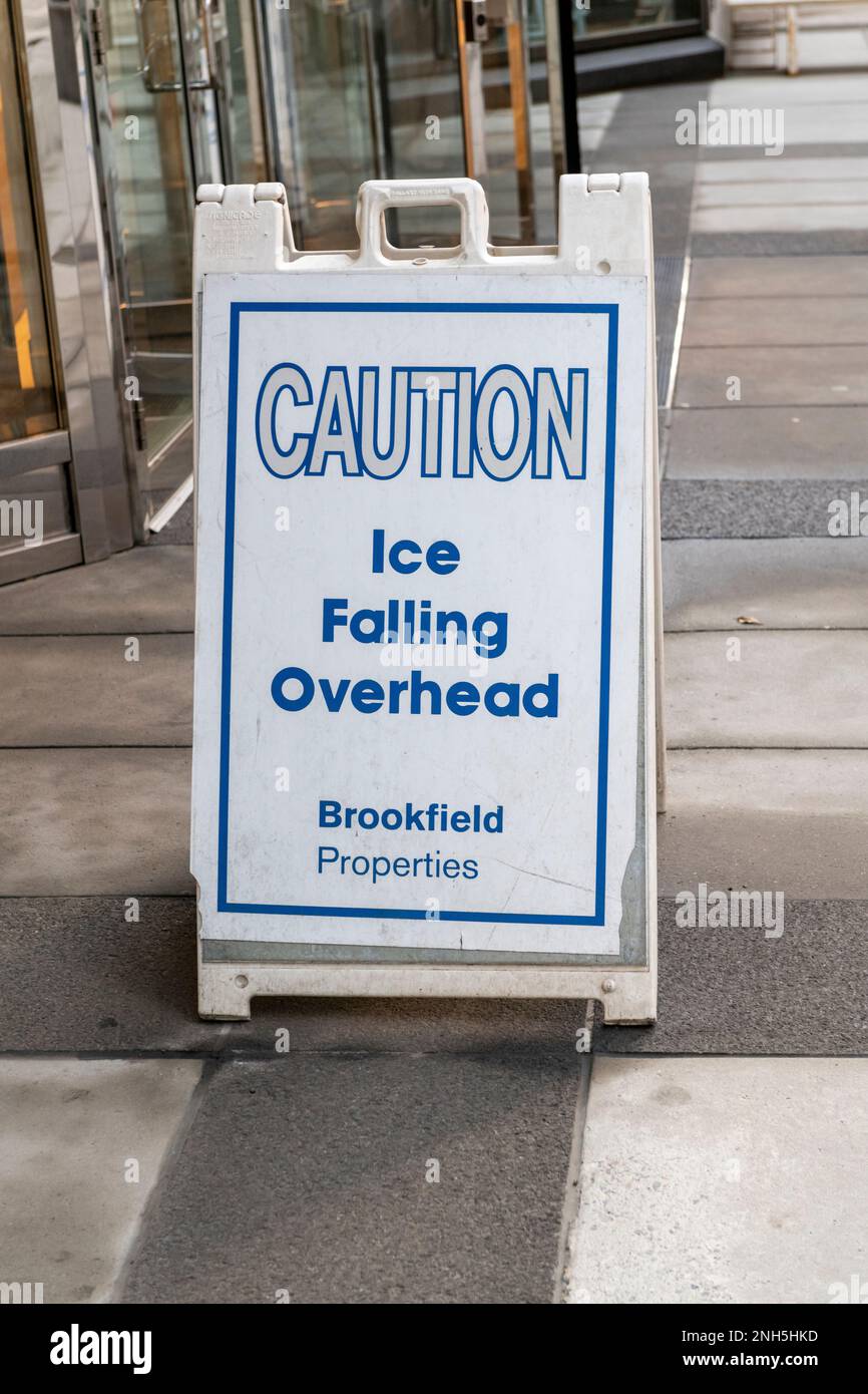Warning sign of overhead ice falling, Calgary, 2 Street SW, Alberta ...