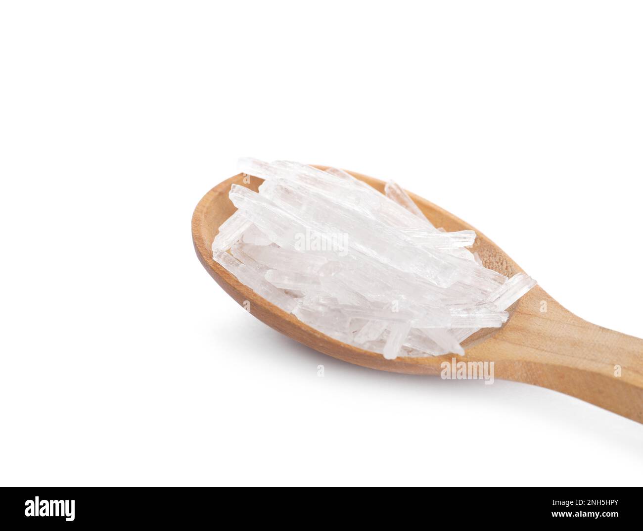 Menthol crystals in spoon on white background Stock Photo - Alamy