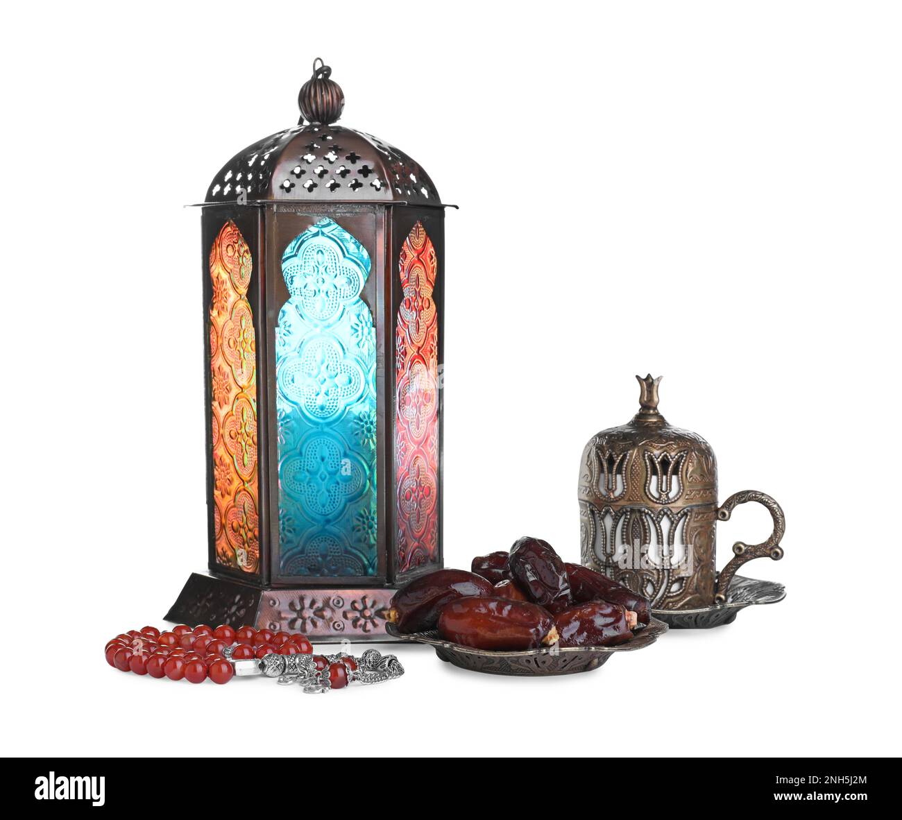 Decorative Arabic lantern, misbaha, dates and coffee on white ...