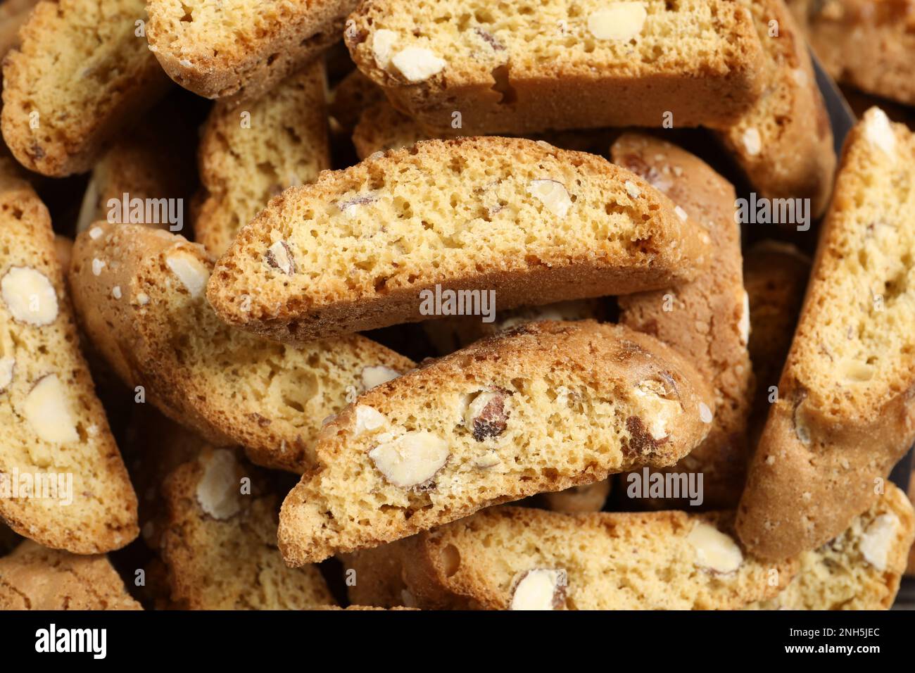 Traditional Italian almond biscuits (Cantucci) as background, closeup ...