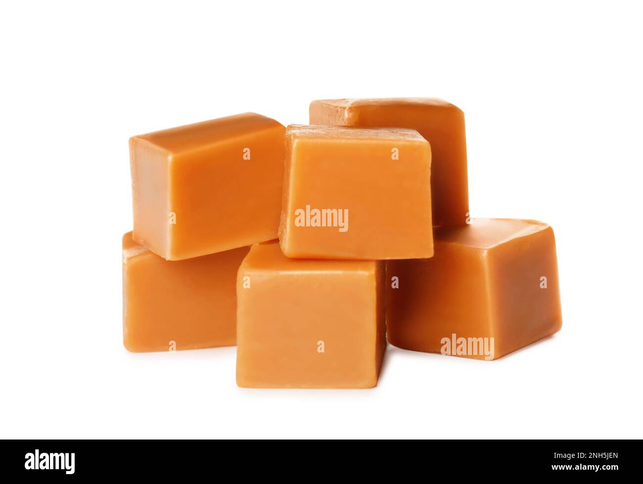 Many caramel cubes on white background. Confectionery Stock Photo - Alamy