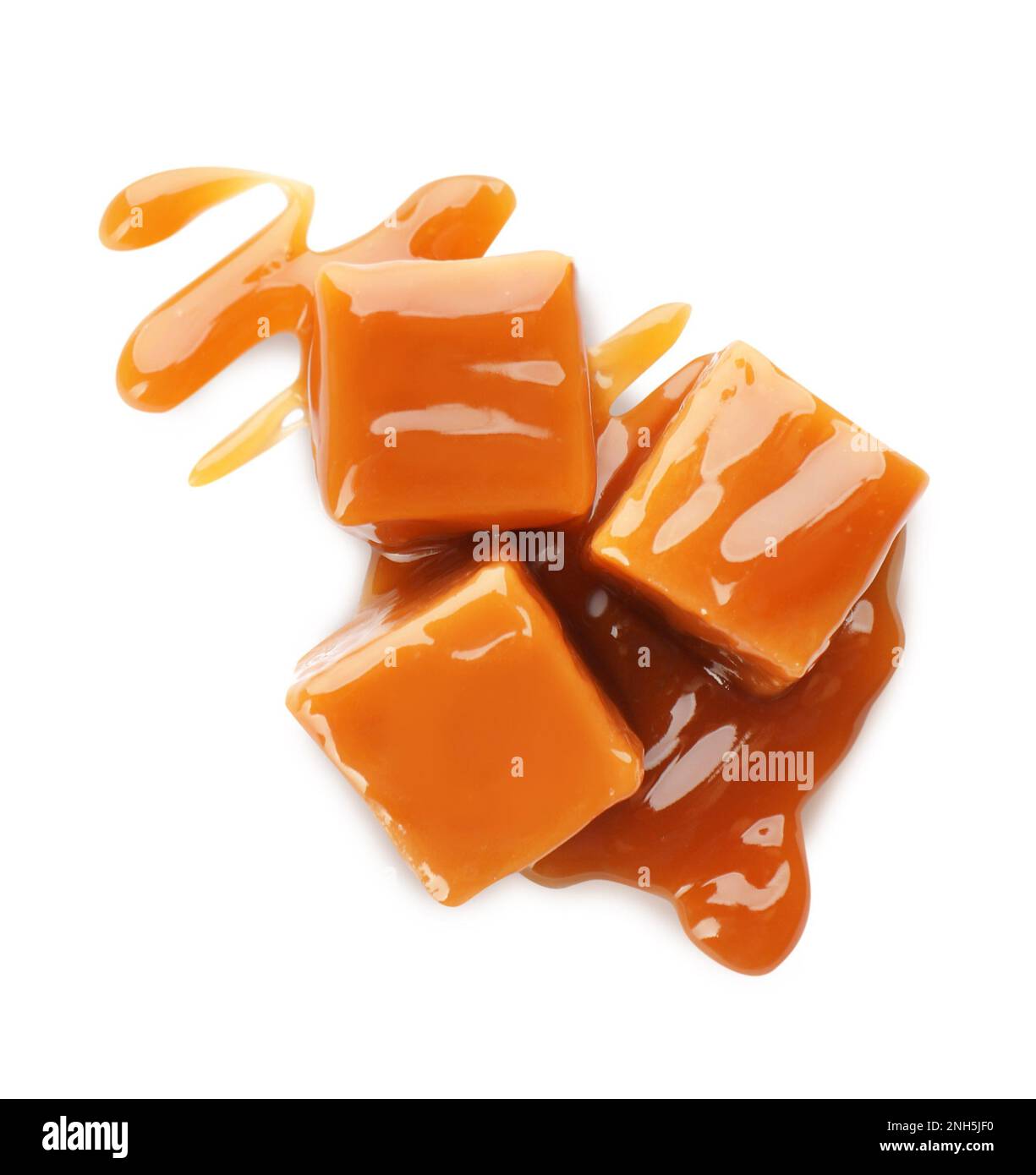 Sweet caramel candies with topping isolated on white, top view Stock ...