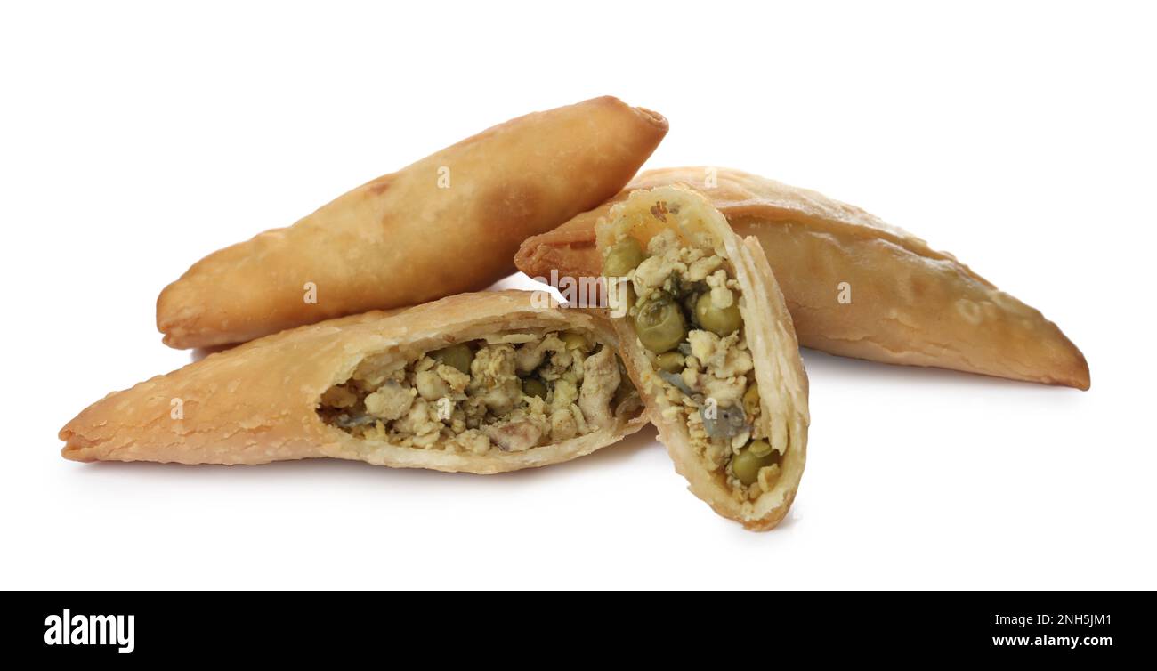 Fresh whole and cut samosas on white background Stock Photo - Alamy