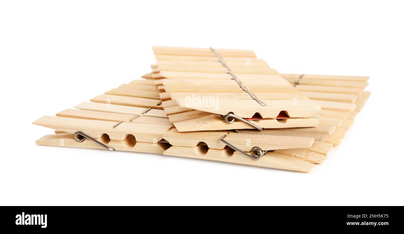 Set of wooden clothespins on white background Stock Photo - Alamy