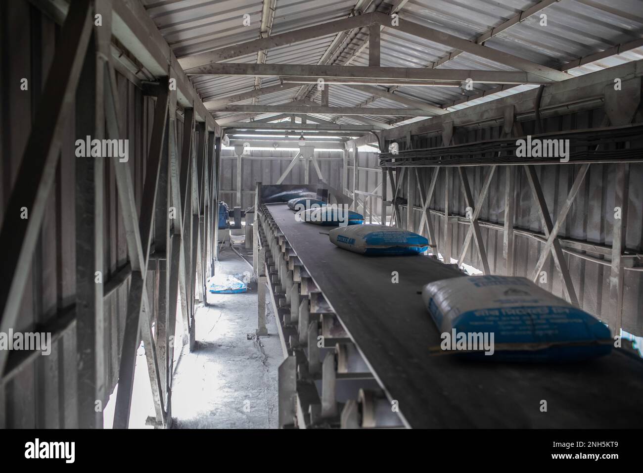 Interior view of cement factory at the Mir cement plant. Mir Cement Ltd ...