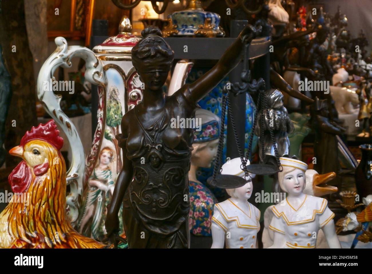 Bronze statue of Lady Justice for sale in a flea market in Paris Stock ...