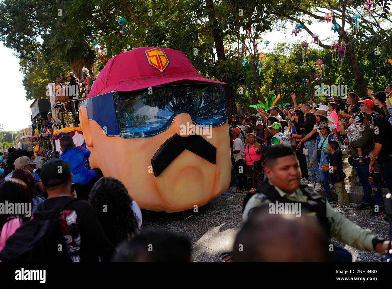 A carnival float depicting Super Mustache, or "Super Bigote" in Spanish ...