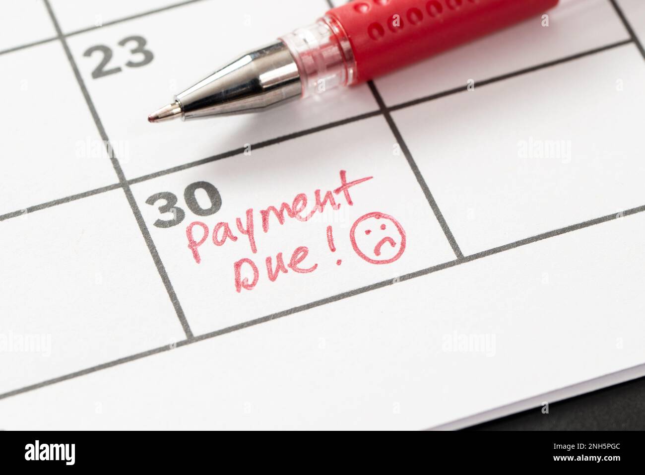 Payment due concept on calendar Stock Photo - Alamy