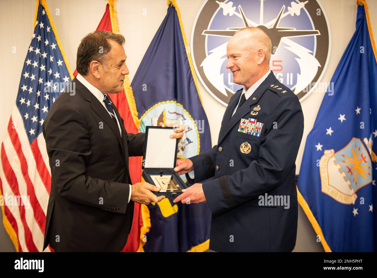 CRYSTAL CITY, VA. (July 18, 2022) – Lt Gen Michael Schmidt (right ...