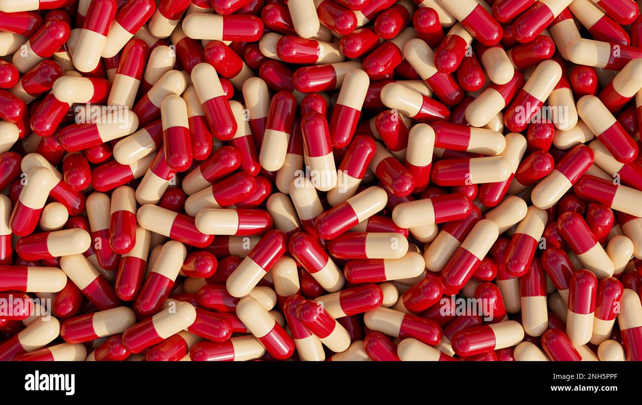 Pile of pills background, pill capsules in red and beige color. drug or ...