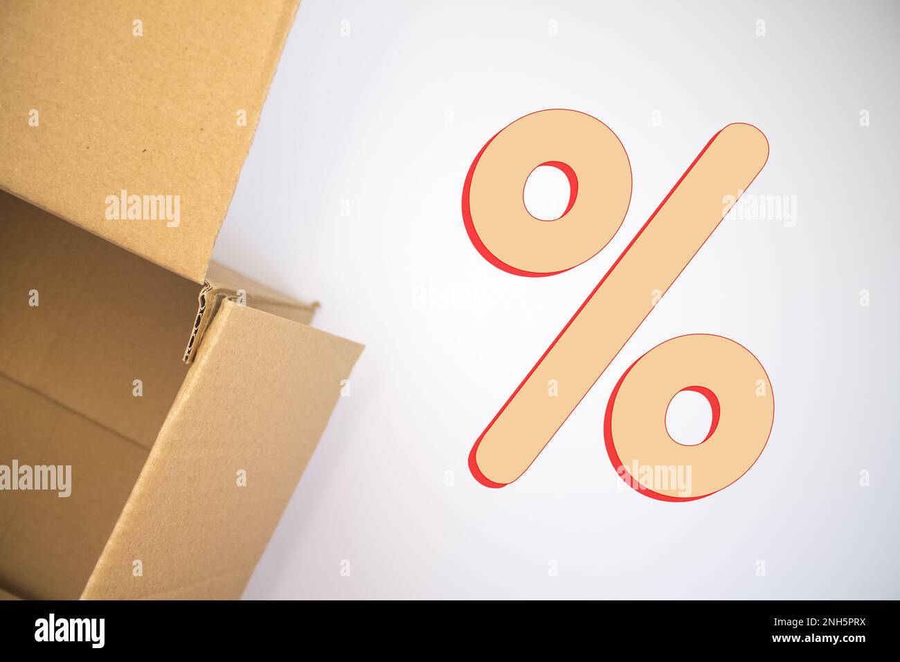 Percentage Sign with cardboard box. Brown folded card box Stock Photo ...