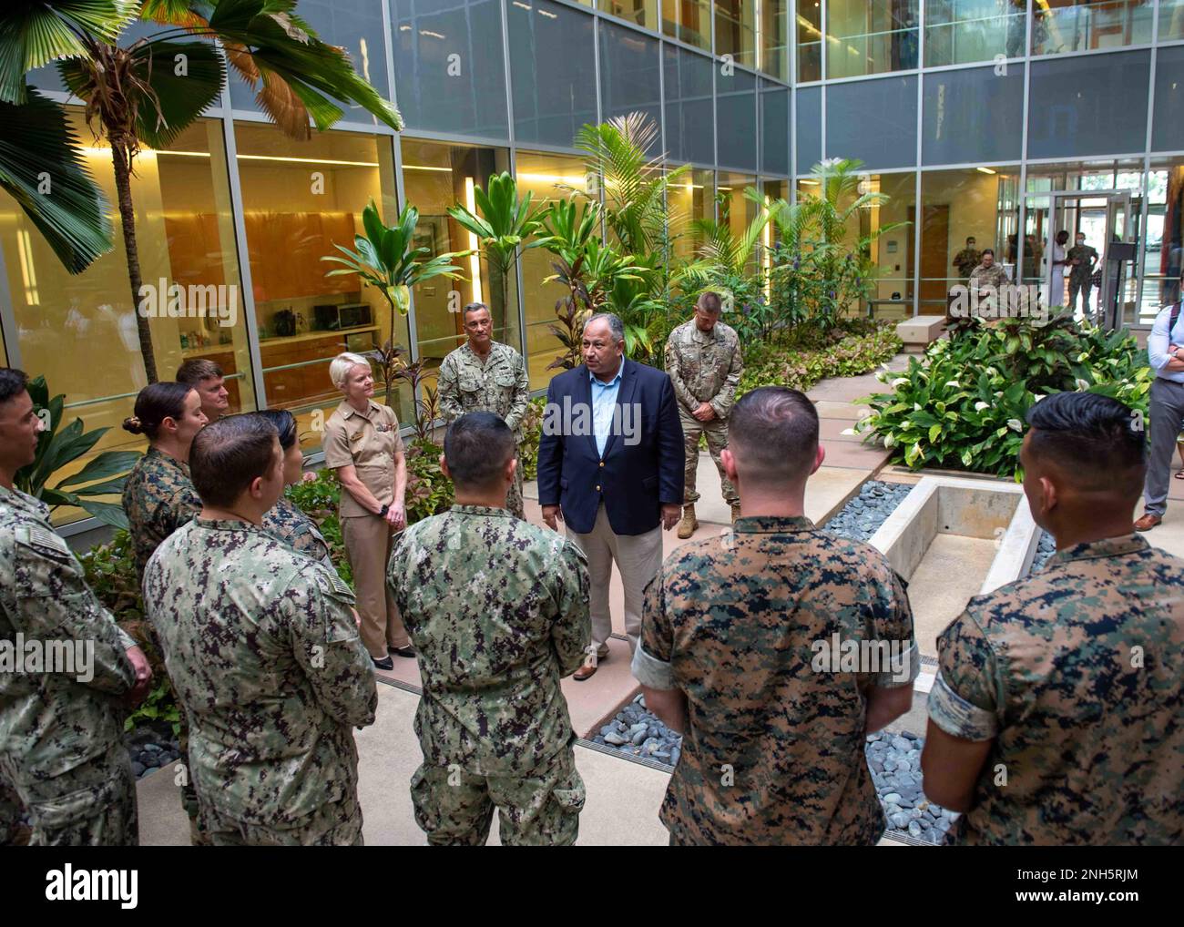 Secretary of the Navy Carlos Del Toro speaks to members of the Defense ...