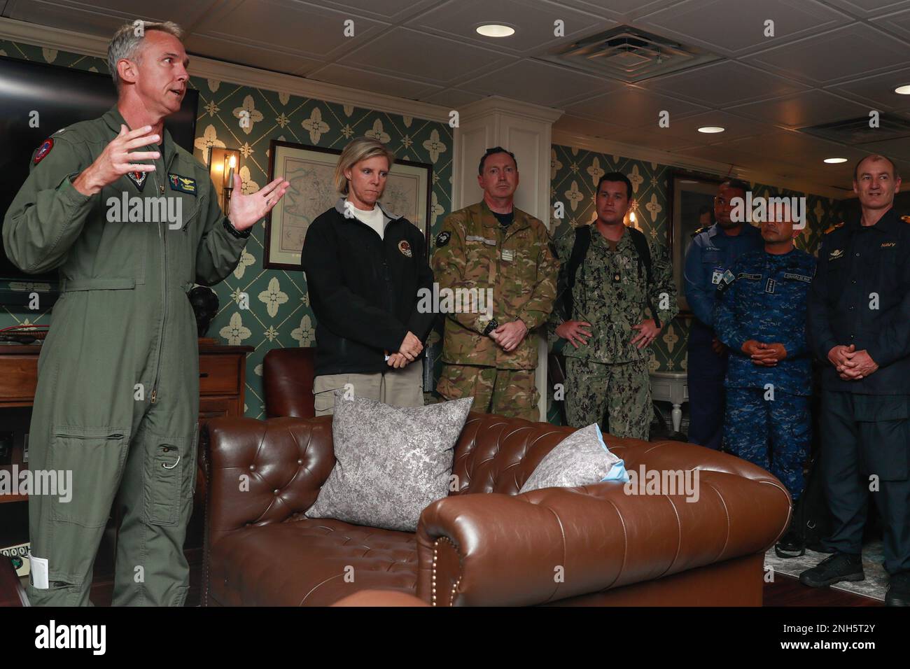 220718-N-CH260-2098 PACIFIC OCEAN (July 18, 2022) U.S. Navy Rear Adm. J.T. Anderson, left ...