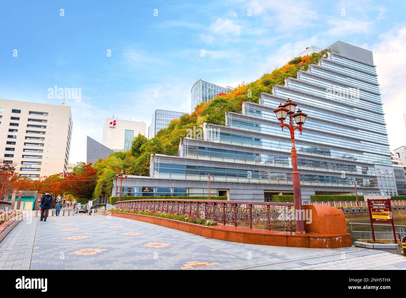 Fukuoka, Japan - Nov 21 2022: ACROS Fukuoka is a conventional office ...