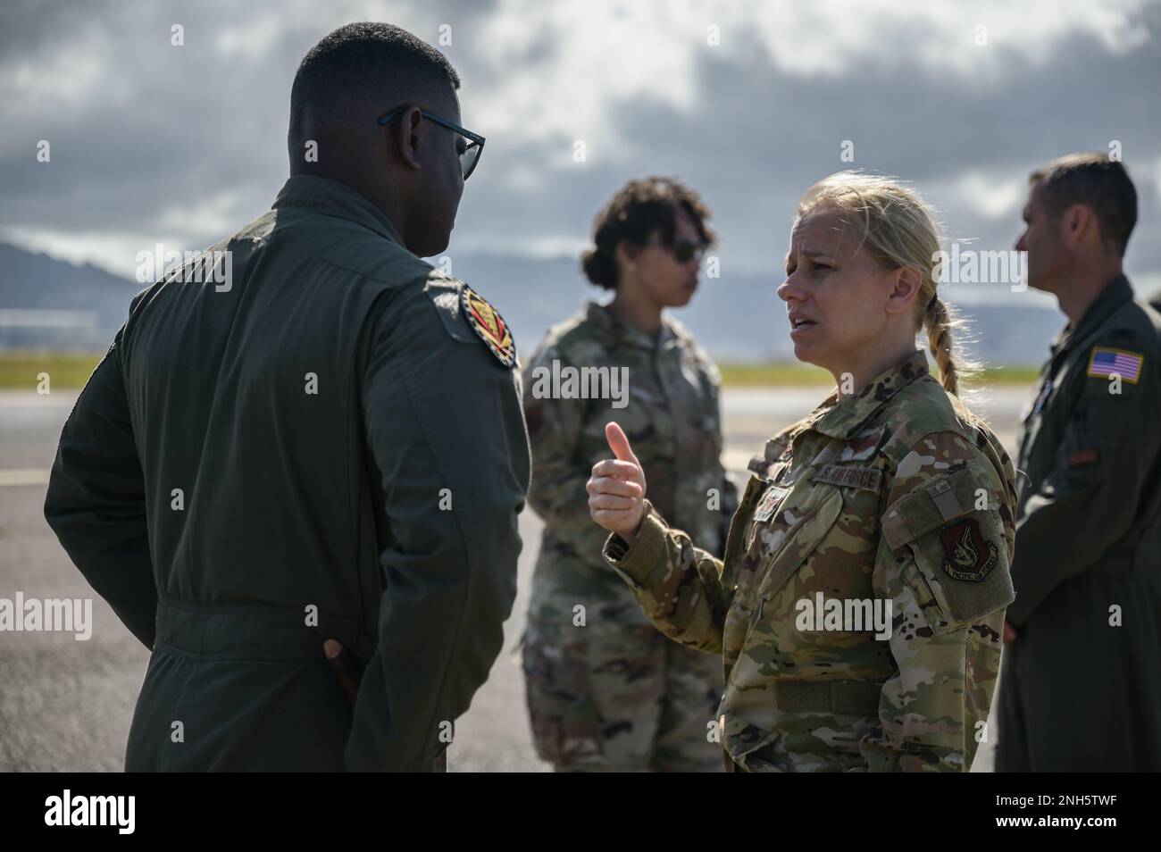 Col. Michele Lo Bianco, 15th Wing commander, speaks with Lt. Col. Paul ...