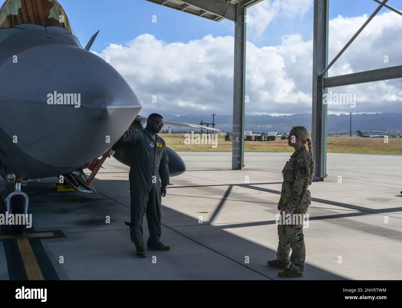 Lt. Col. Paul Lopez, 19th Fighter Squadron commander, speaks with Col ...