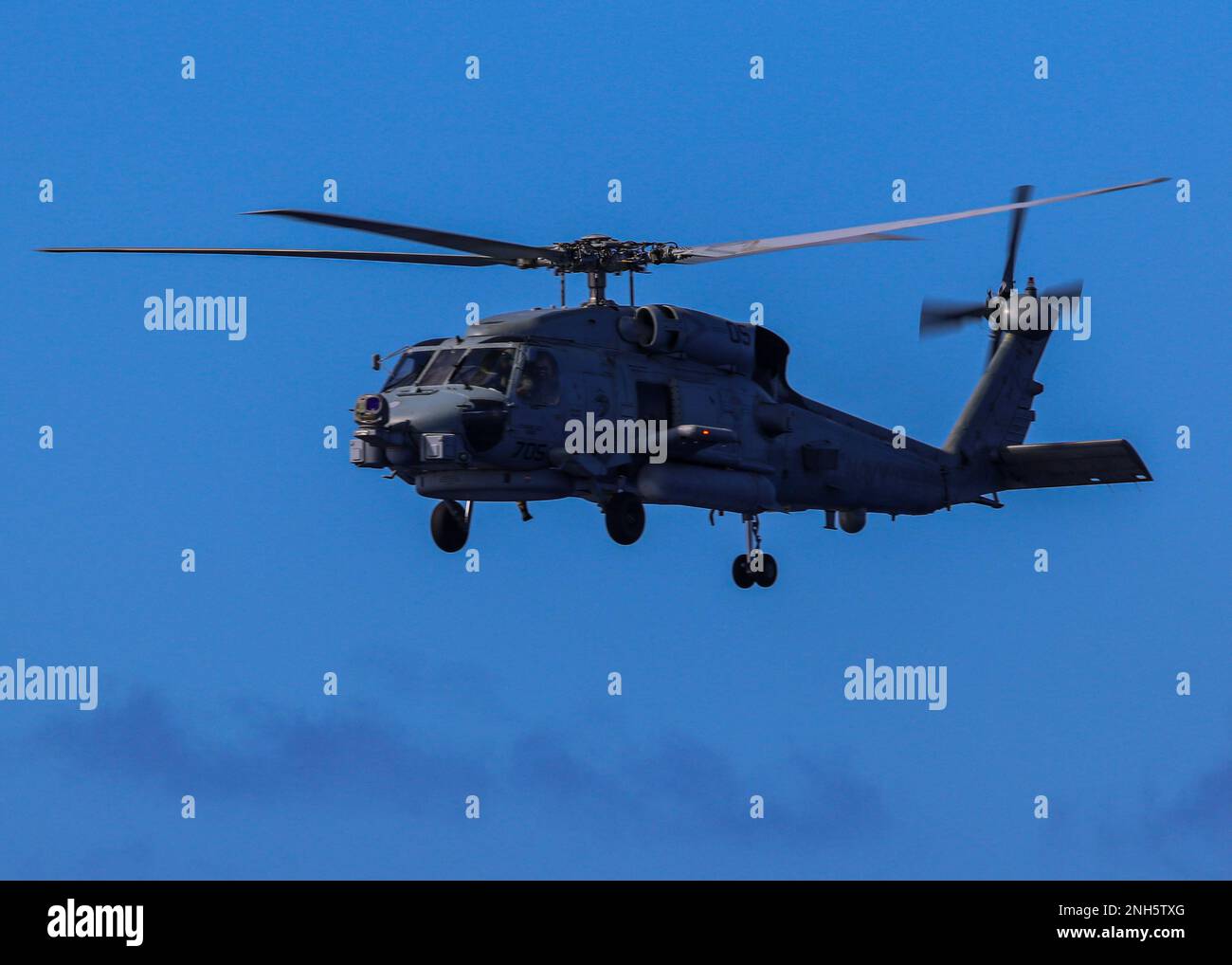 PACIFIC OCEAN (July 18, 2022) An MH-60R Sea Hawk helicopter, attached ...