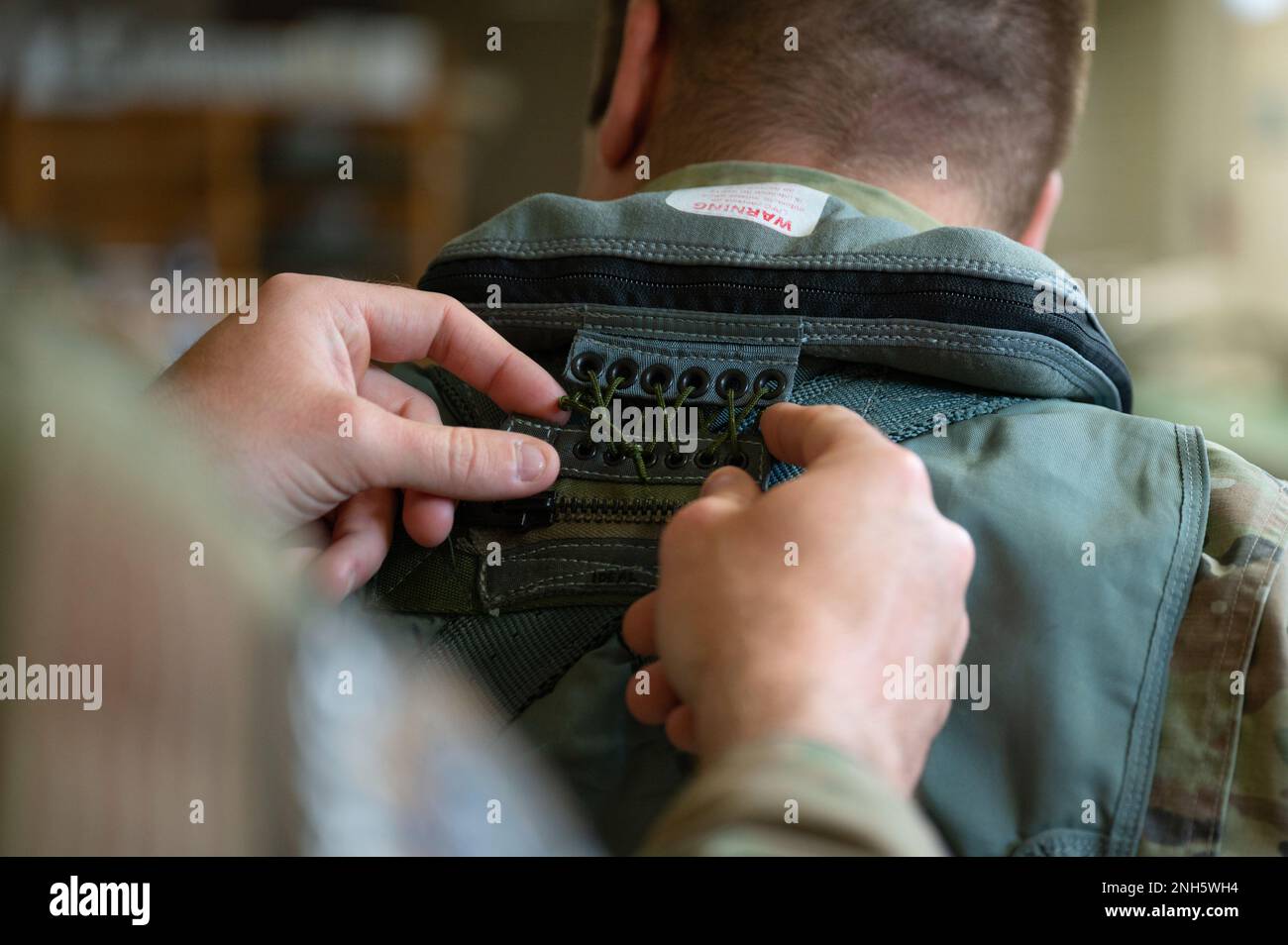 The lacing configuration connecting a life preserver unit with a ...