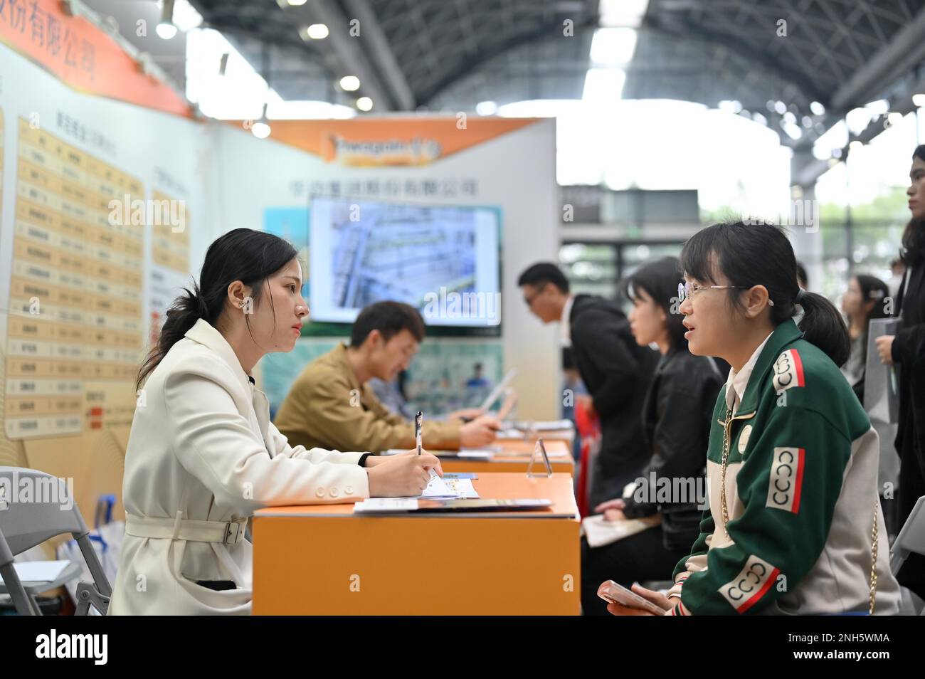 **CHINESE MAINLAND, HONG KONG, MACAU AND TAIWAN OUT** People look for jobs a career fair held in ...