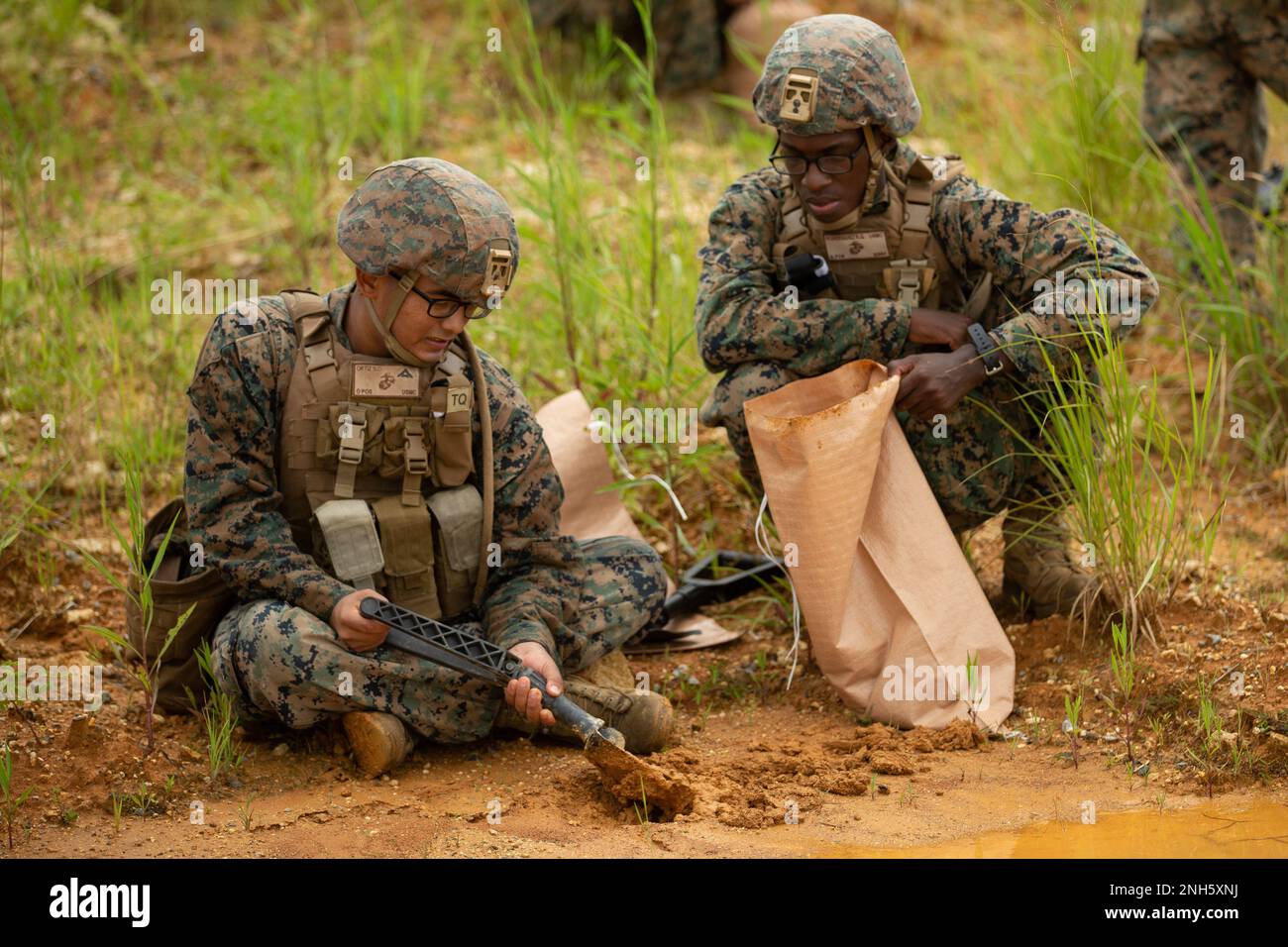 U.S. Marine Corps Lance Cpl Salvador Ortiz, left, and Lance Cpl. Reno ...