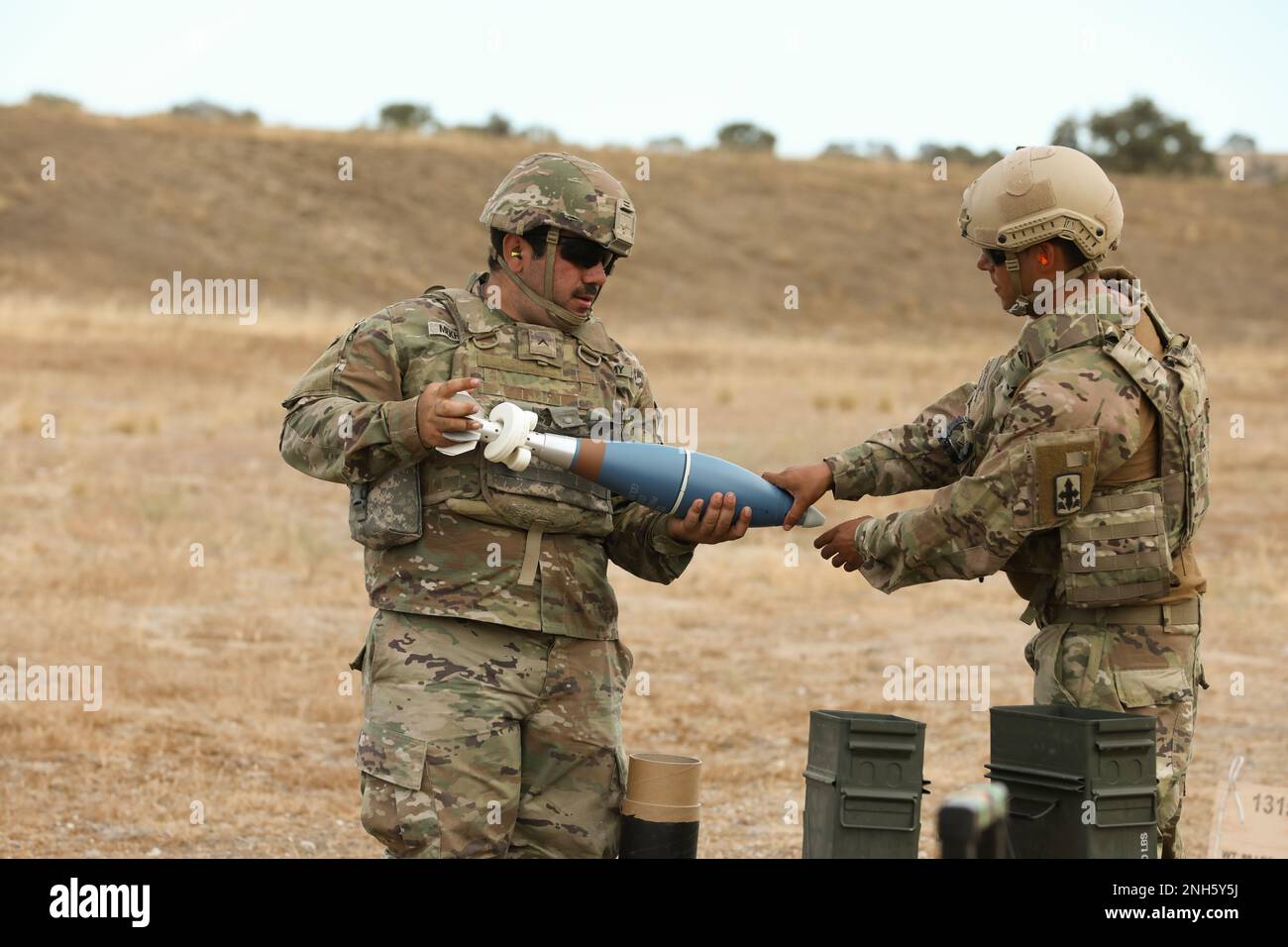 Arizona Army National Guard Sgt. Curtis McGrew, right, an indirect fire ...