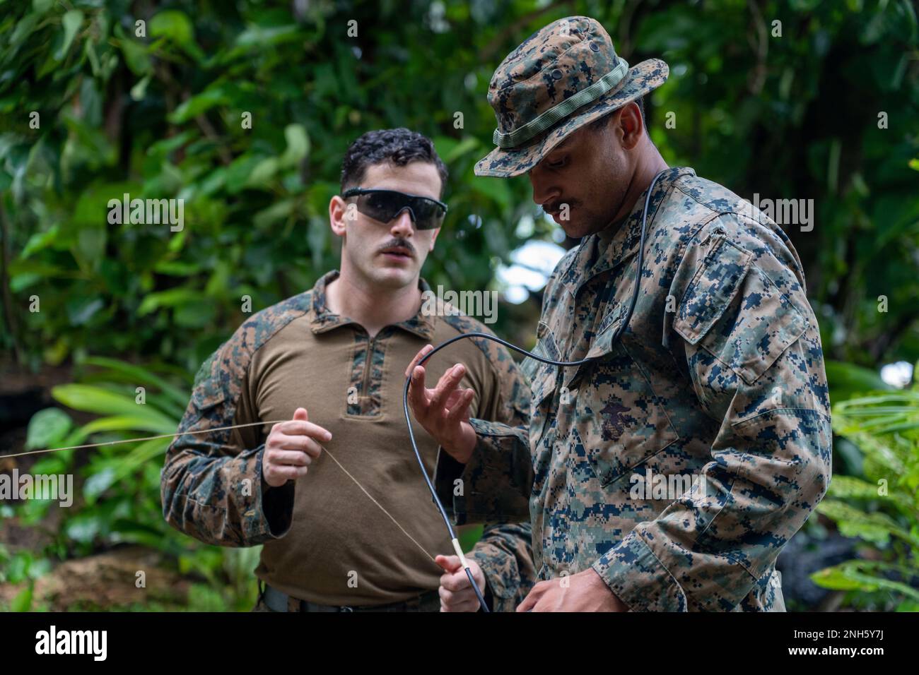U.S. Marine Corps 1st Lt. Isaac Chesler, left, a communications officer ...