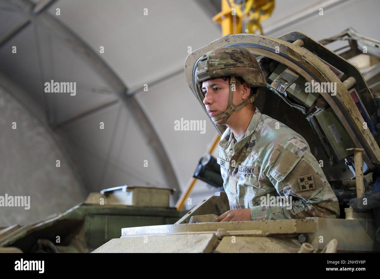 U.S. Army Pfc. Austin Gore, a mechanic assigned to Apache Troop, 4th ...