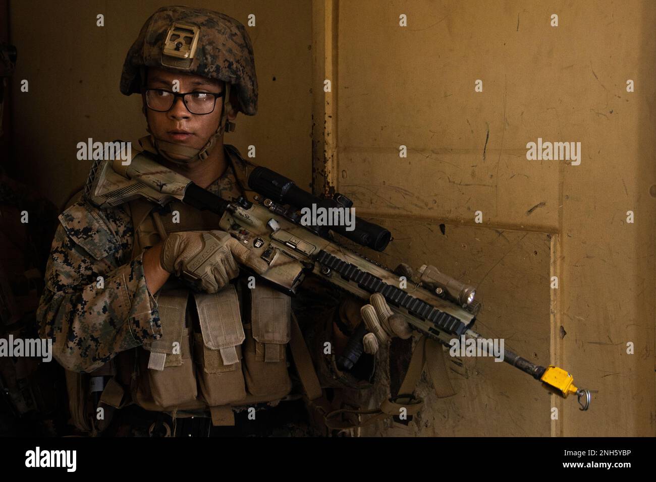 U.S. Marine Corps Lance Cpl. Bryan Dang, a rifleman with Bravo Company ...