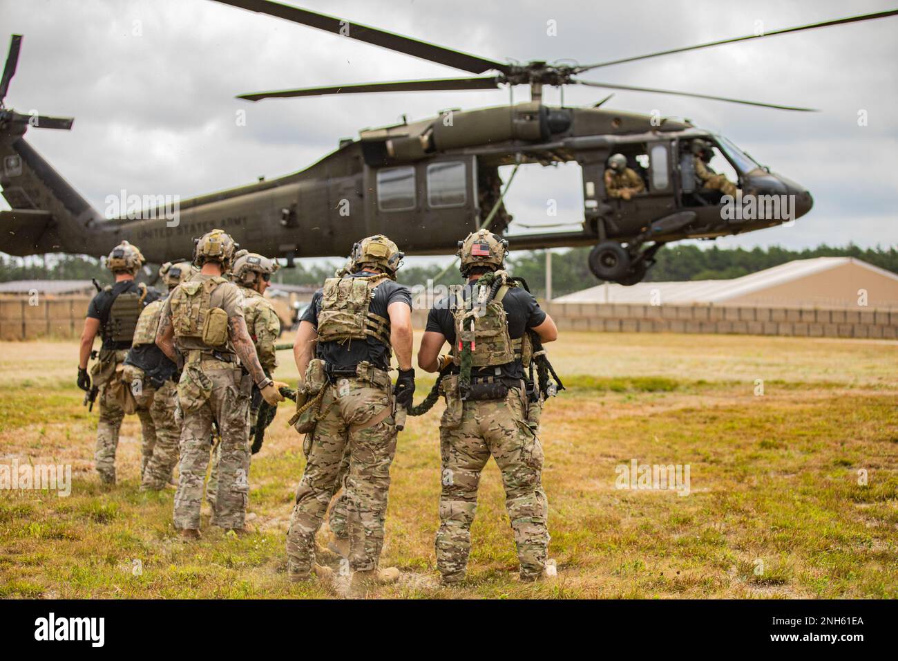 U.S. Army Special Operations Soldiers conduct fast rope insertion ...