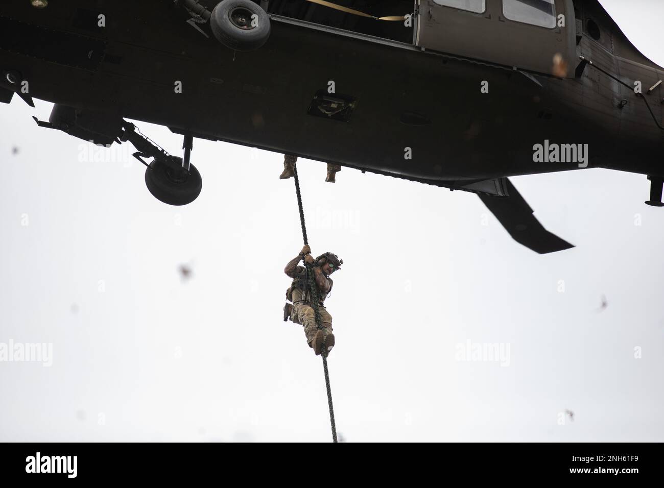 U.S. Army Special Operations Soldiers conduct fast rope insertion ...