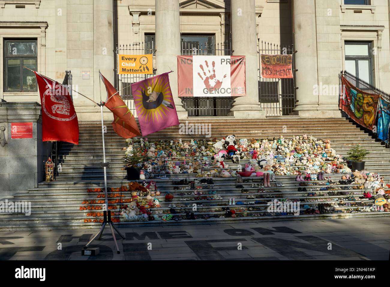 Residential schools memorial and First Nations protest signs on the ...