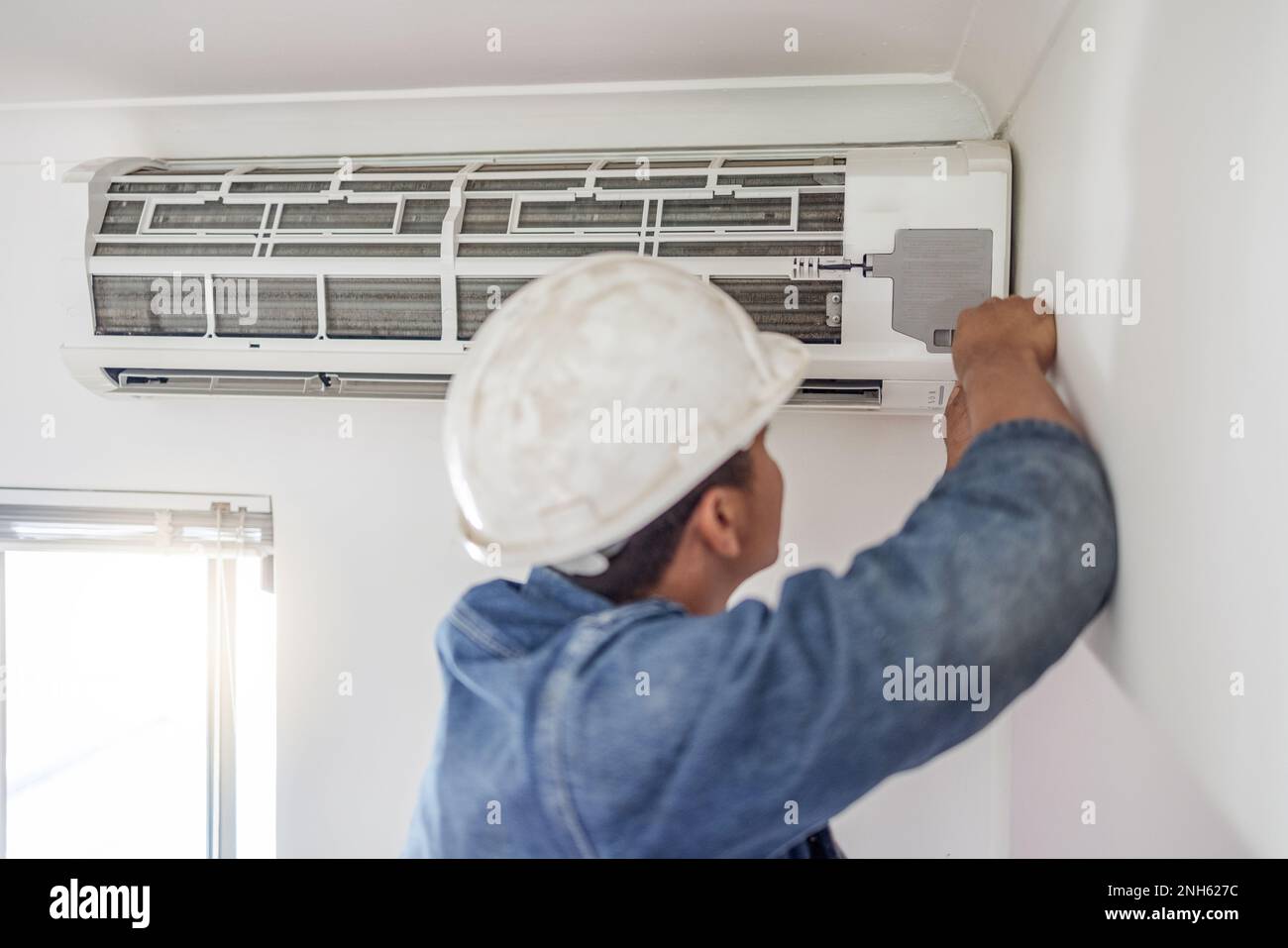 Air conditioner, ac repair and building hvac maintenance of a handyman ...
