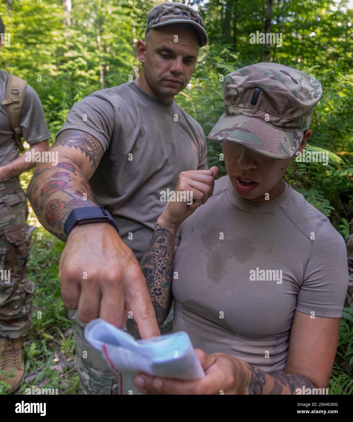 Army Reserve Staff Sgt. Devin Crawford (left), 108th Training Command ...