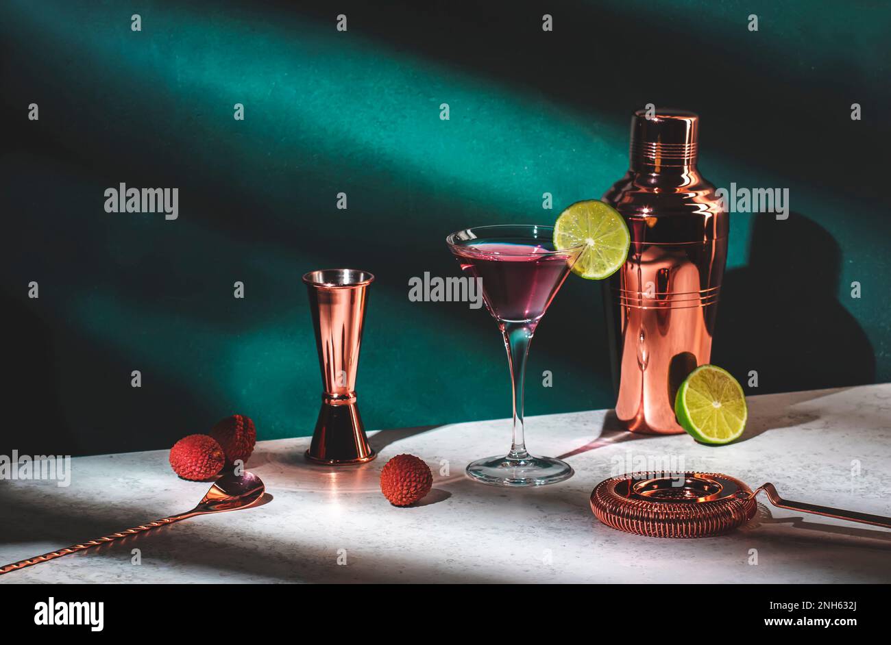 Alcoholic cocktail drink with vodka, gin, lychee, lime juice and ice ...