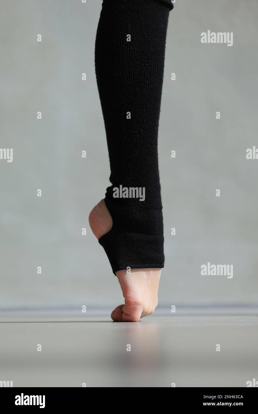 Sports legs close up. Training, element of gymnastics, performs ...