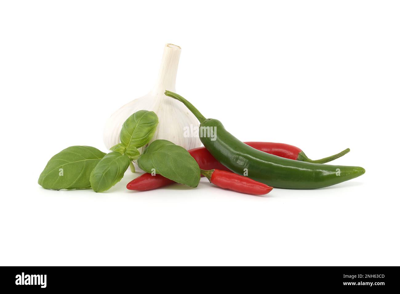 Chili peppers, basil sprig and garlic bulb isolated on white background ...