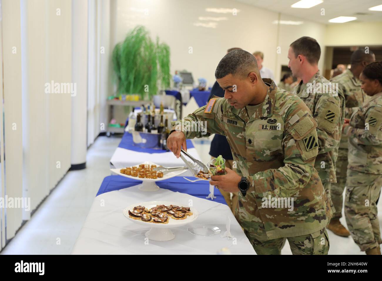 Soldiers assigned to 3rd infantry Division enjoy food during a culinary ...
