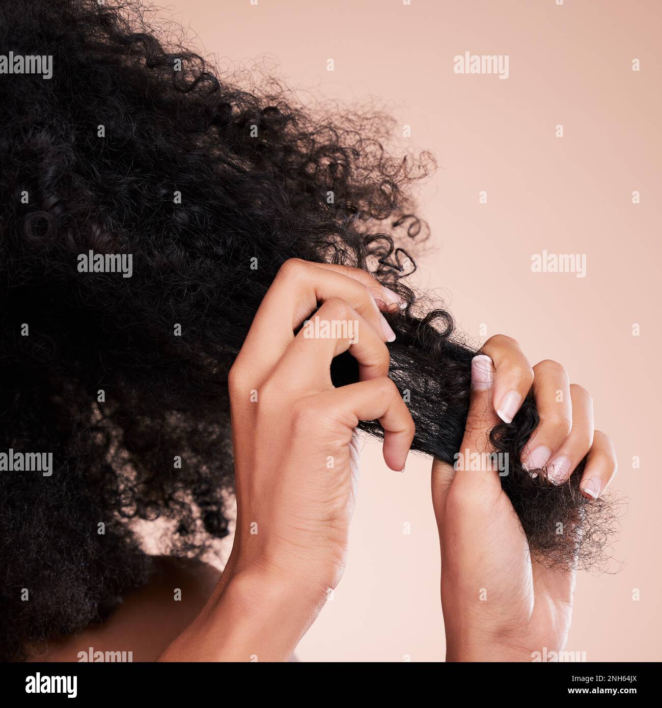 Beauty, hair texture and hands of black woman in studio for self care ...